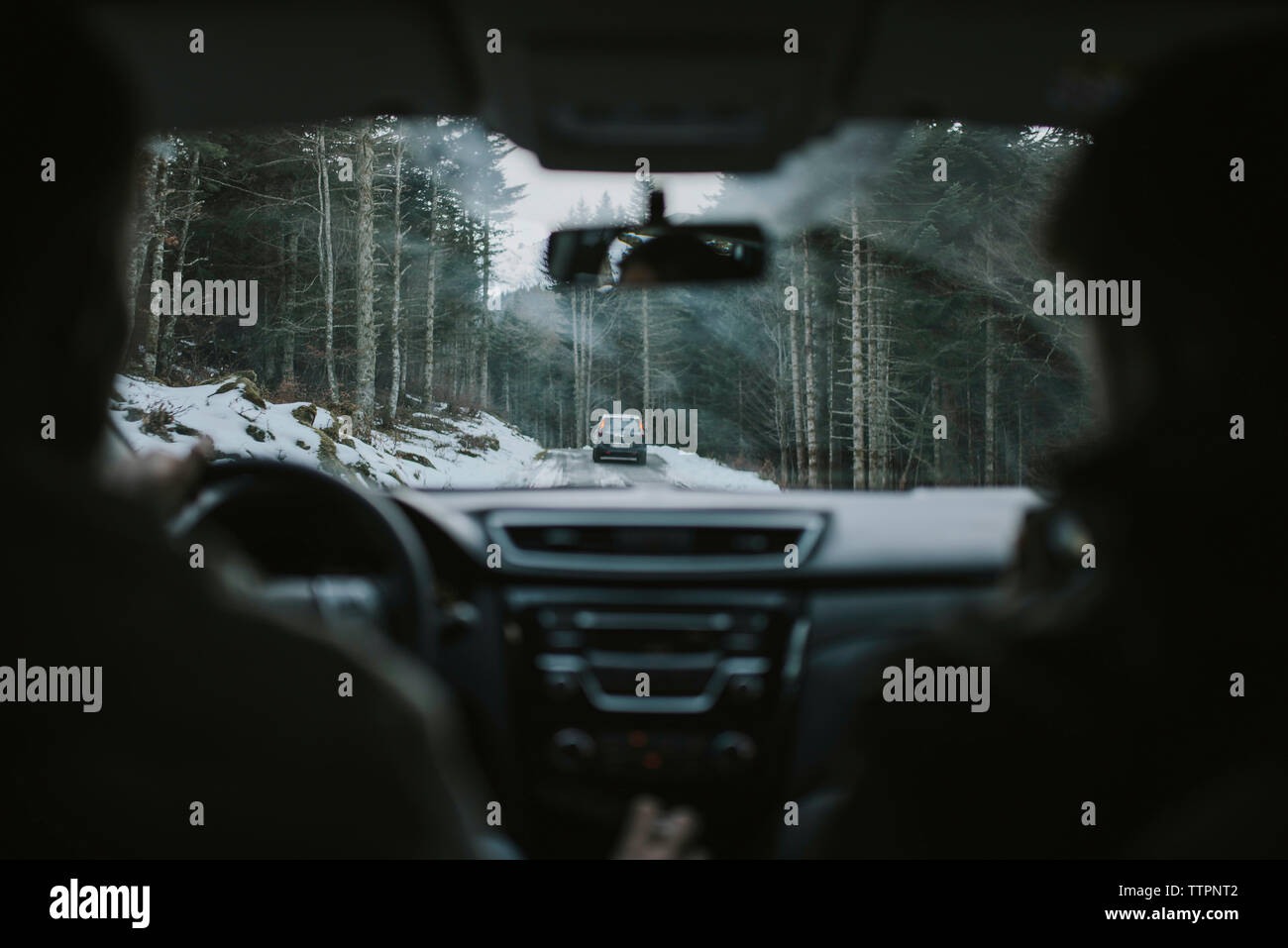 Rear view man driving car hi-res stock photography and images - Alamy