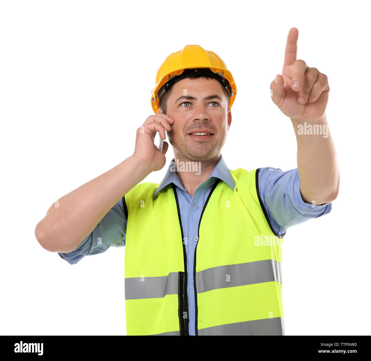 Construction worker with cellphone, isolated on white Stock Photo - Alamy