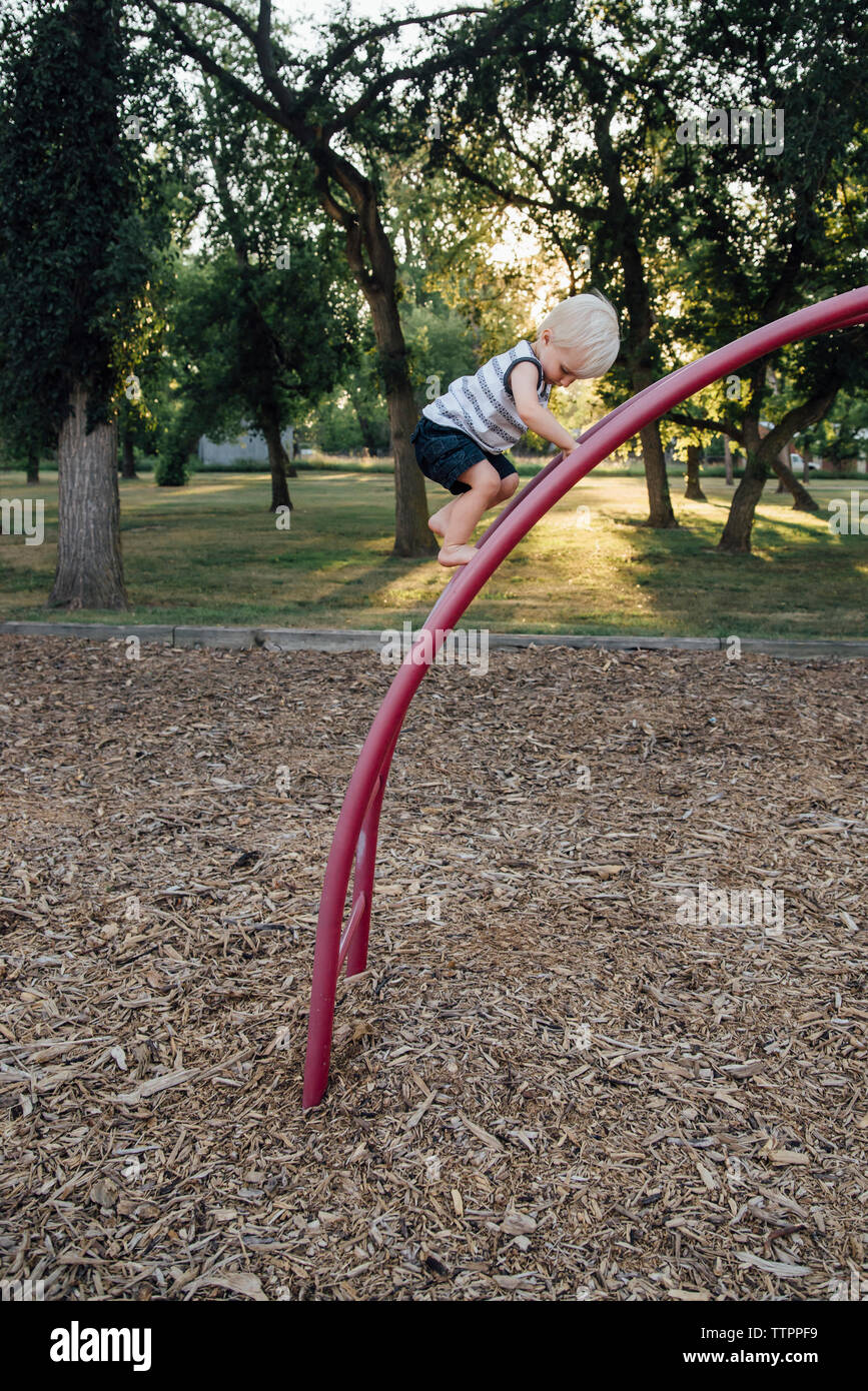 Baby climbing playground hi-res stock photography and images - Alamy