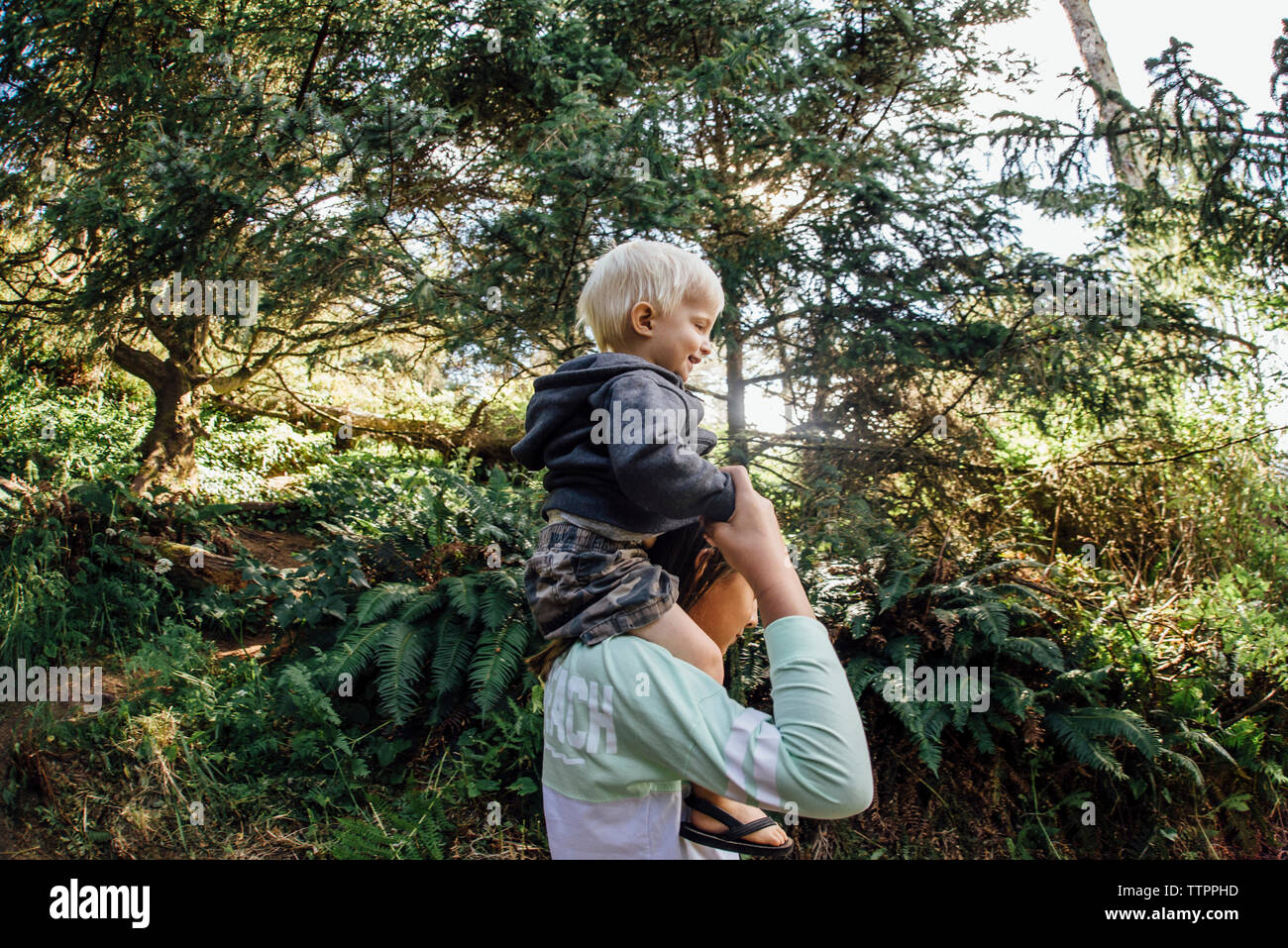 Girl and boy standing side by side hi-res stock photography and images ...
