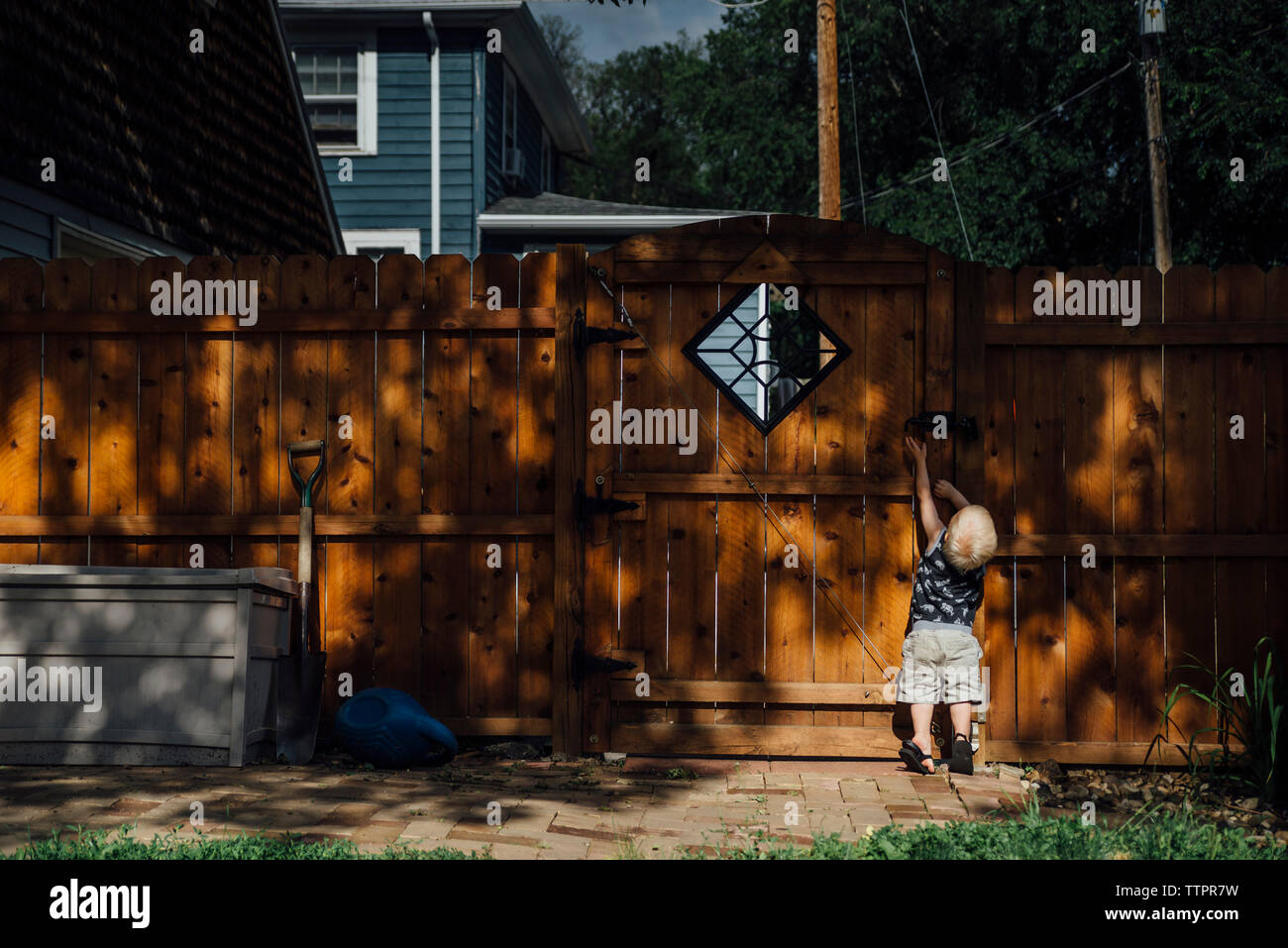 Person opening gate hi-res stock photography and images - Alamy