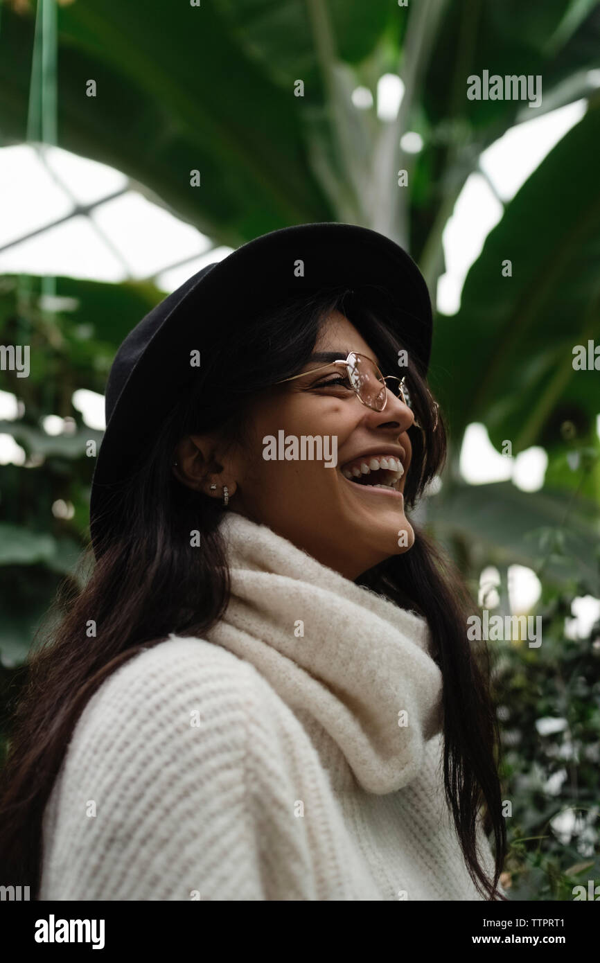 Woman wearing green sweater glasses hi-res stock photography and images ...