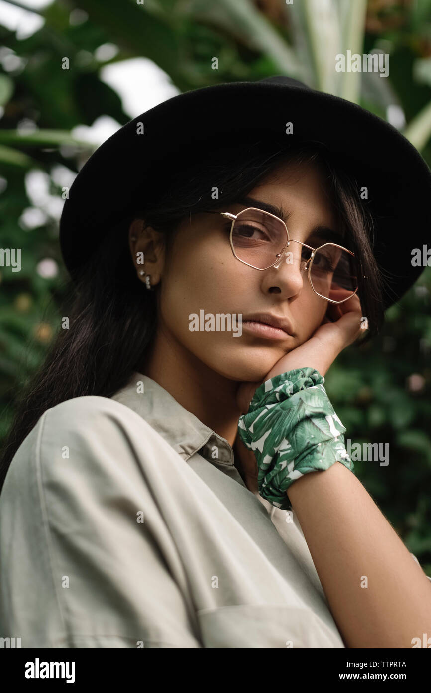 Thoughtful female fashion model hi-res stock photography and images - Alamy