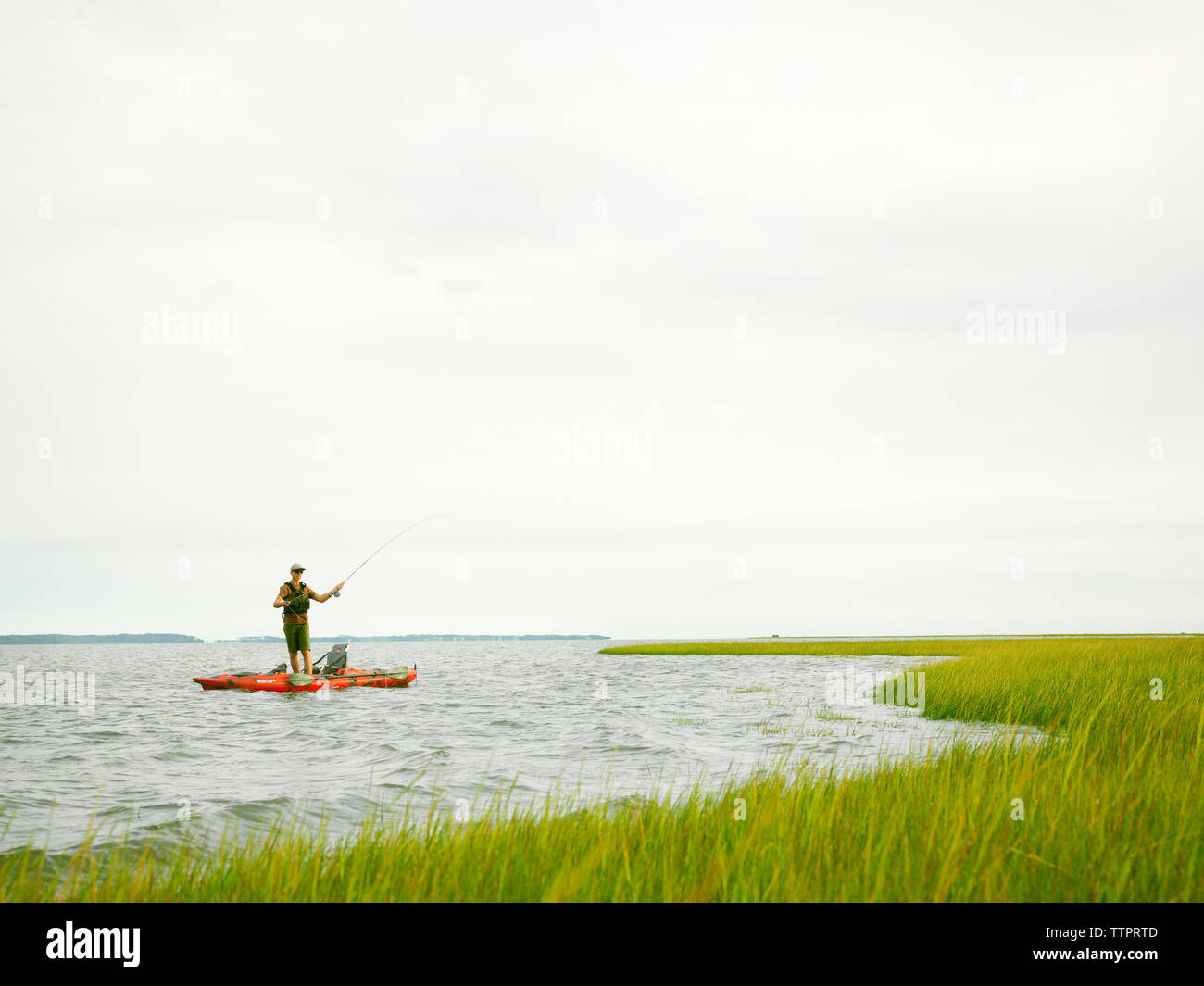 Fly fishing a marsh on the Atlantic coast from a kayak Stock Photo - Alamy