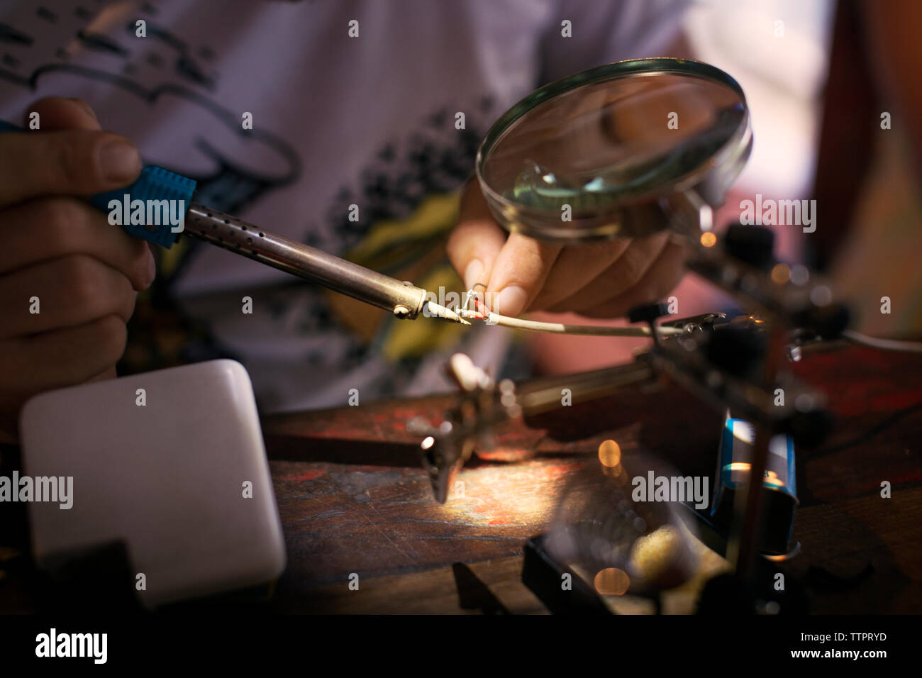 Man soldering hi-res stock photography and images - Alamy