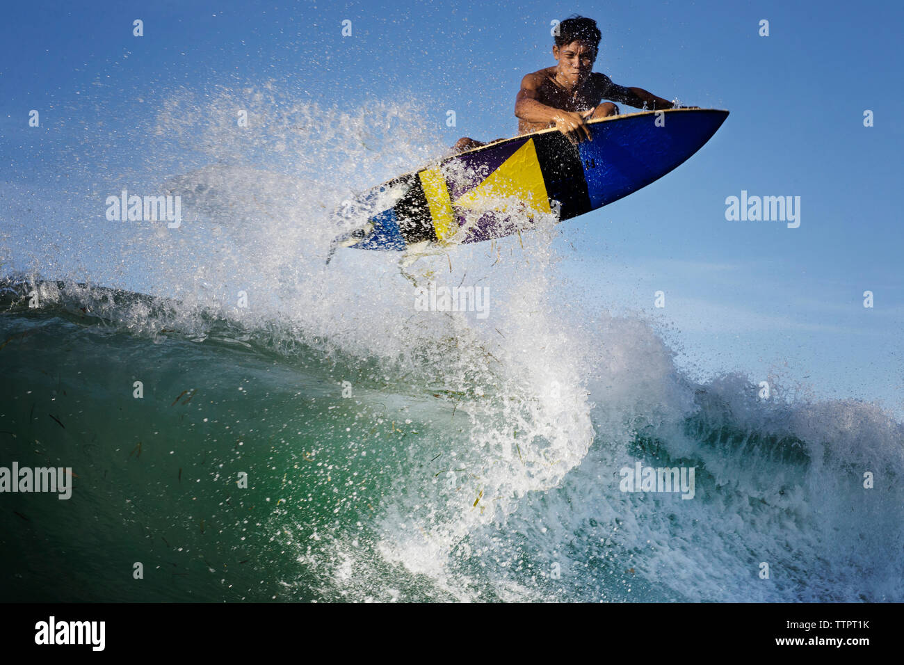 Jumping over the waves hi-res stock photography and images - Alamy