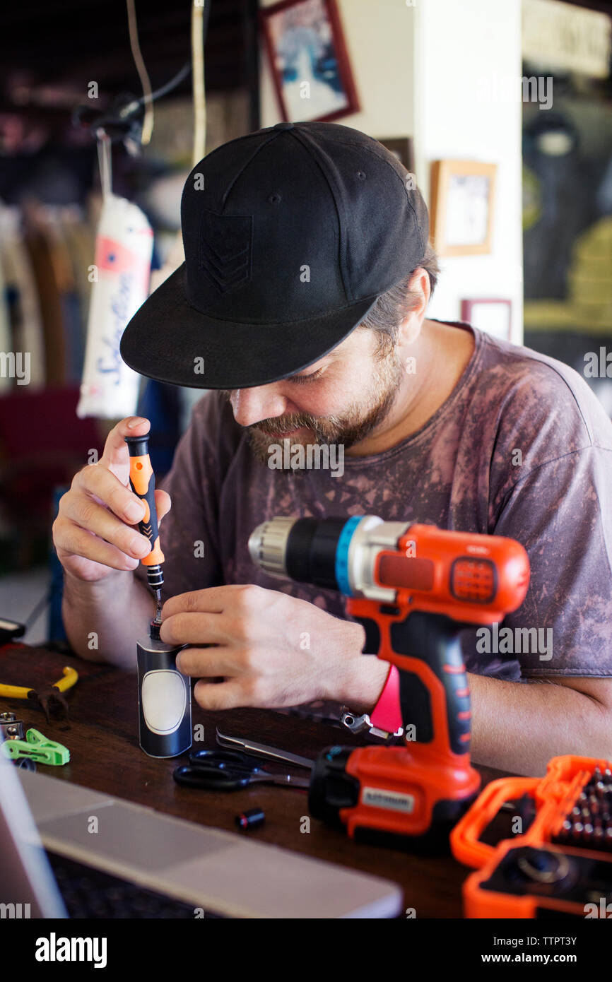 Man using power drill hi-res stock photography and images - Alamy