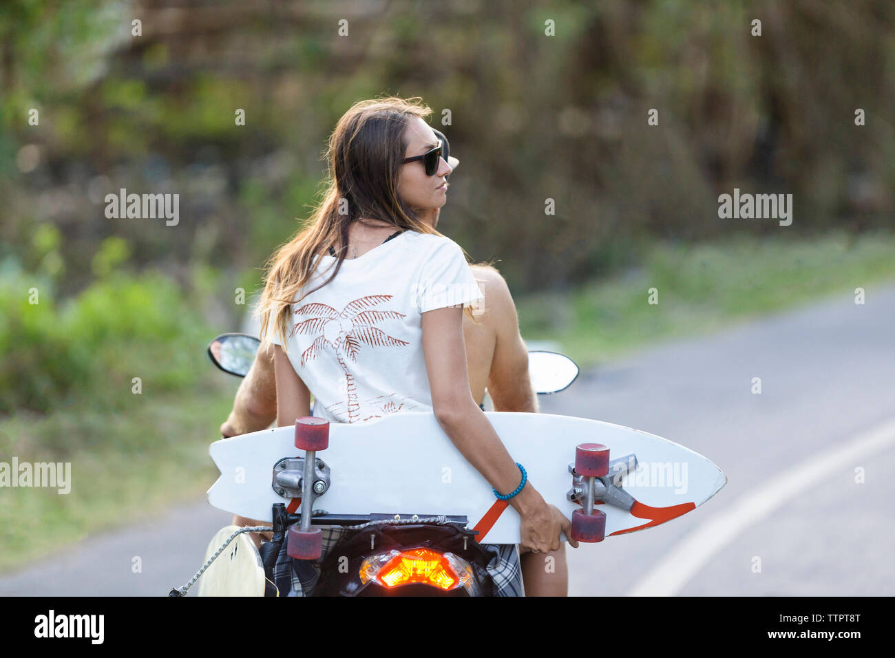 Man and woman riding motorcycle hi-res stock photography and images - Alamy
