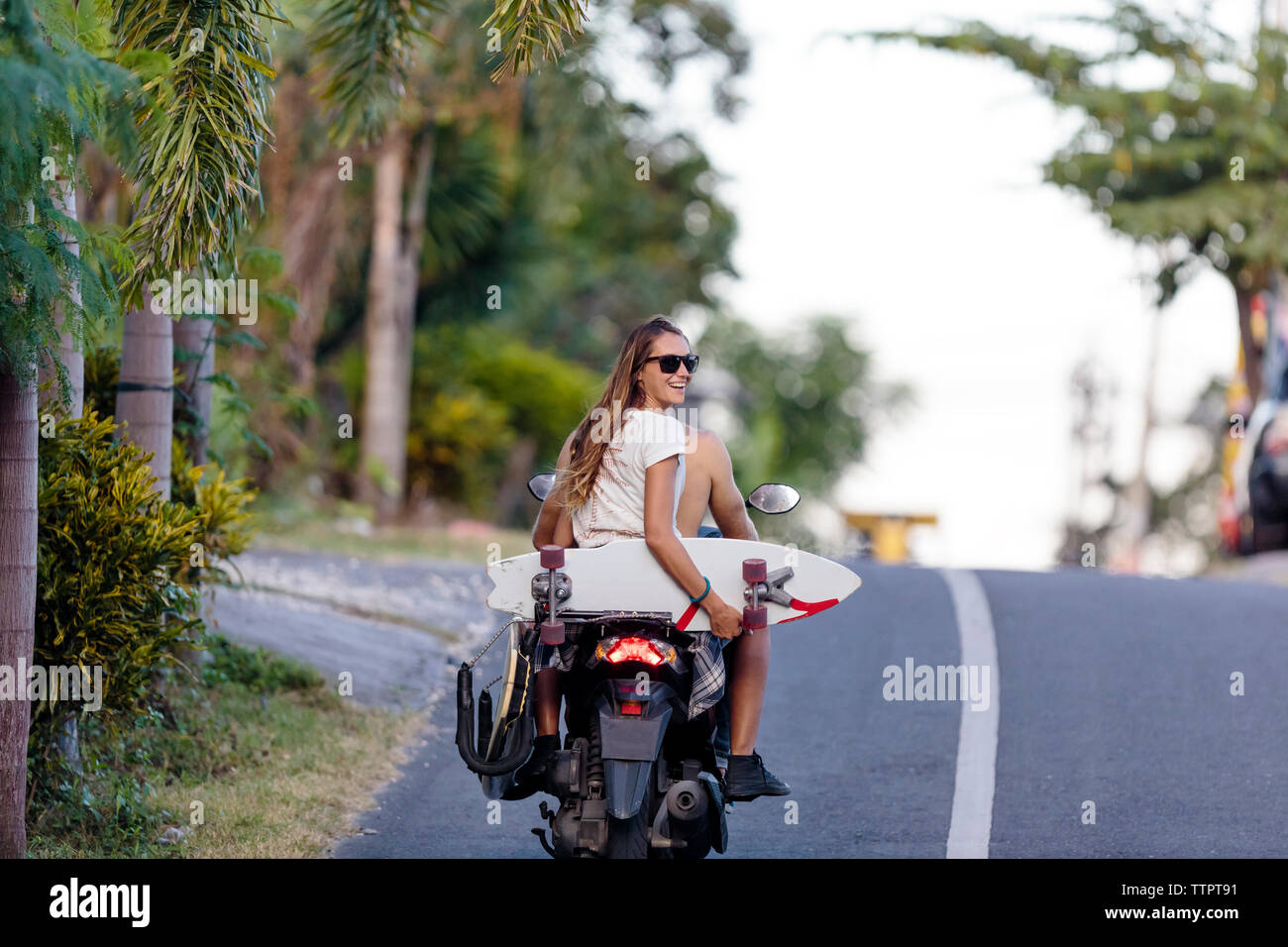 Rear view riding motorcycle hi-res stock photography and images - Alamy