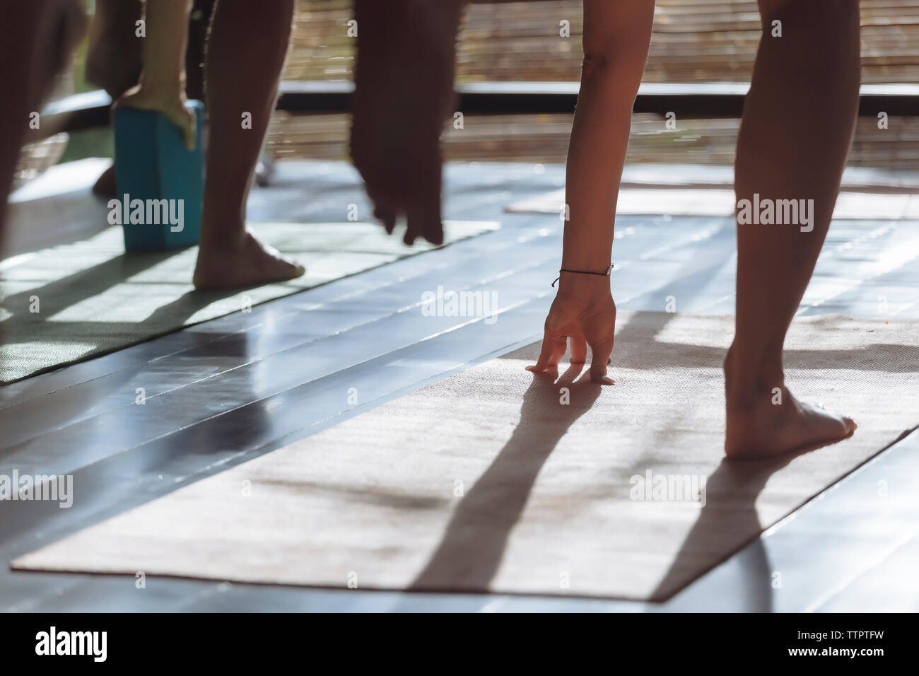 Low section of women exercising in studio Stock Photo - Alamy