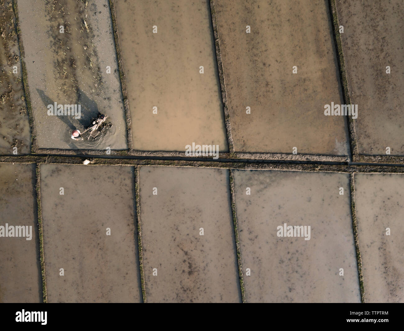 Aerial view of tractor on agricultural field Stock Photo - Alamy
