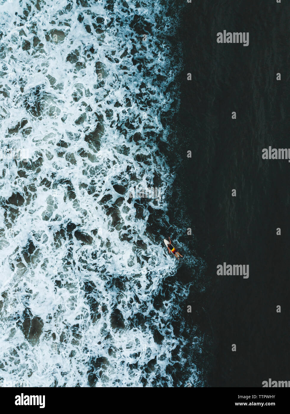 Aerial view of surfer Stock Photo - Alamy