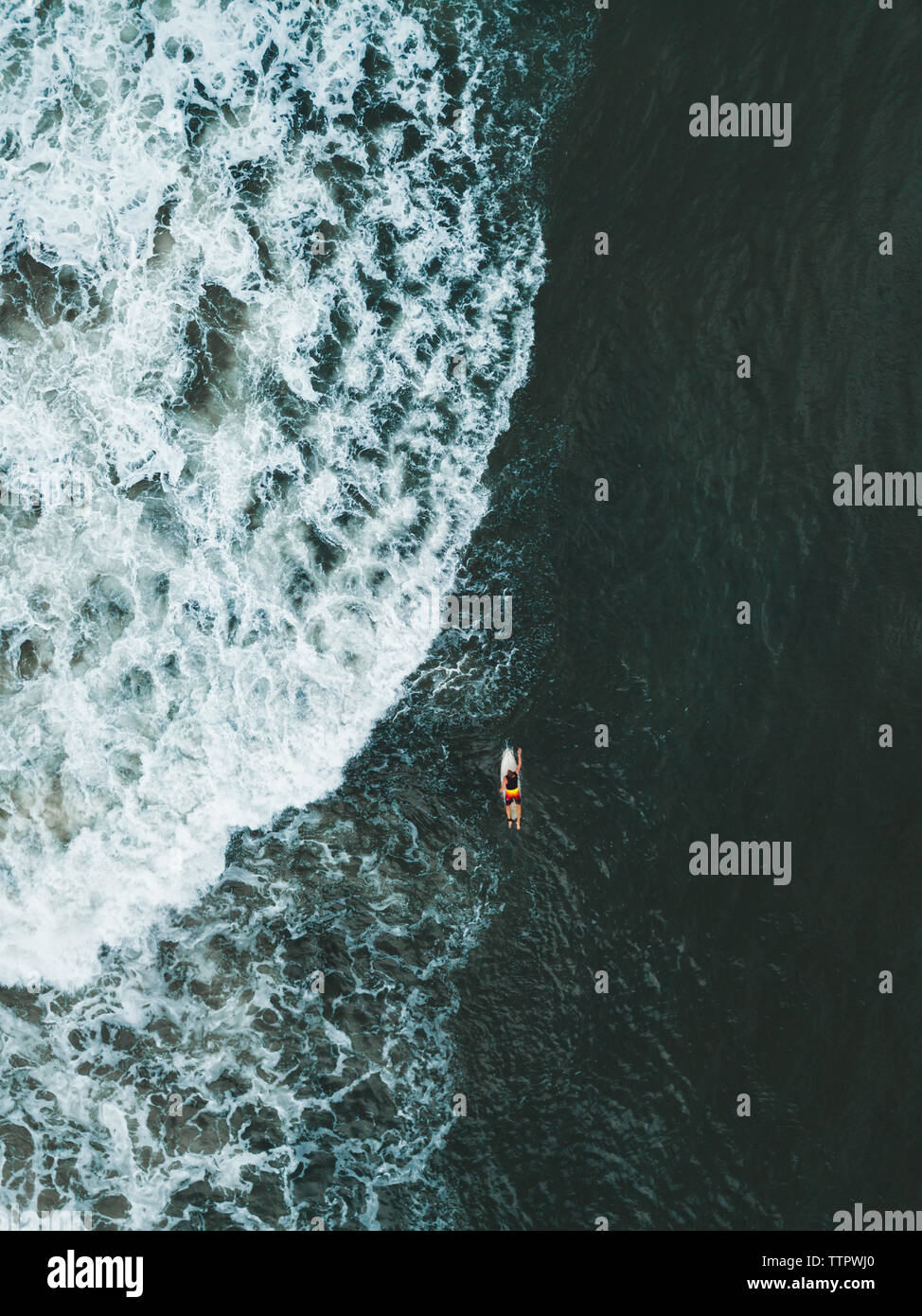 Surfer above wave hi-res stock photography and images - Alamy