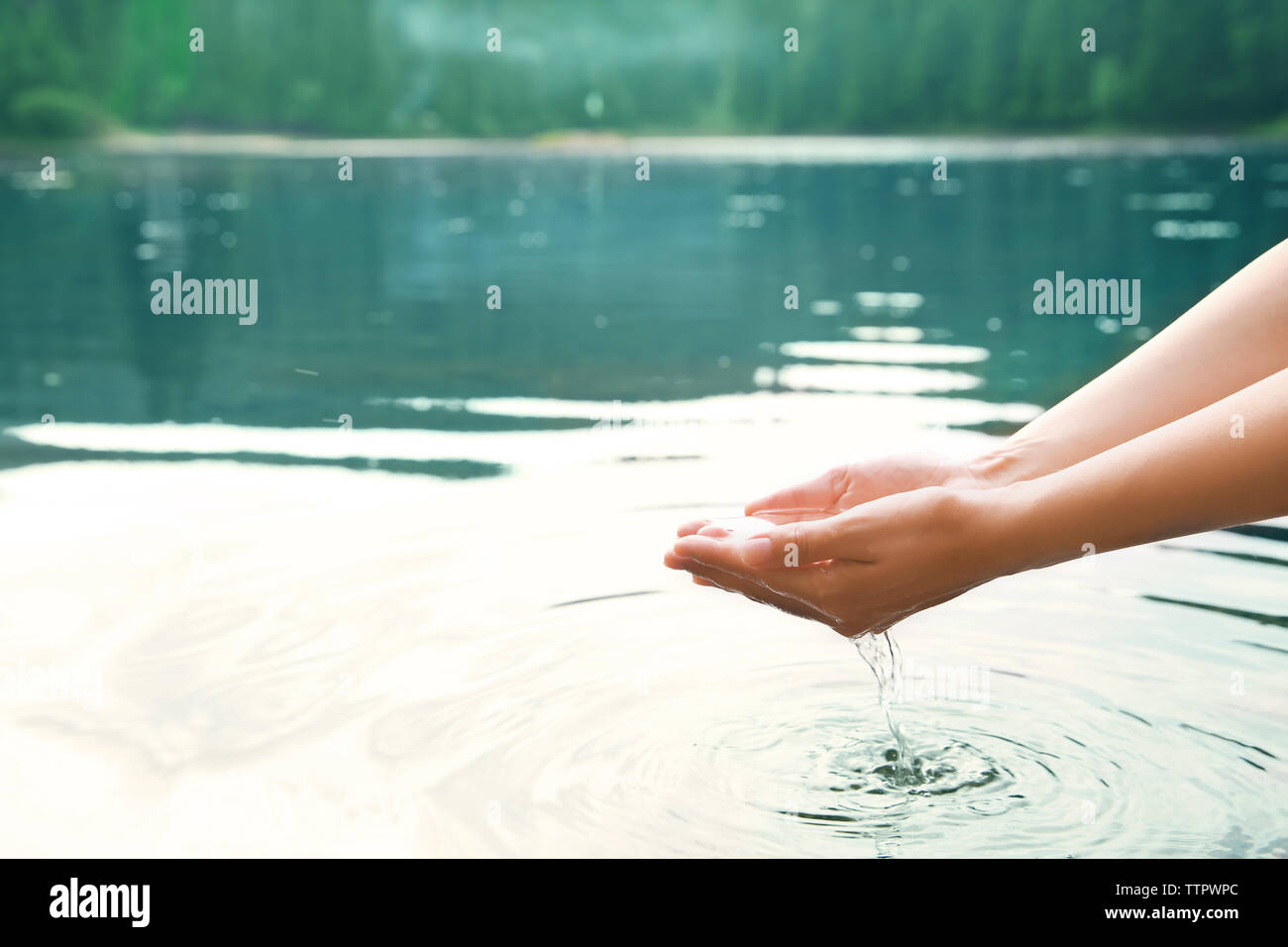 Clean water pouring splashing hands hi-res stock photography and images ...