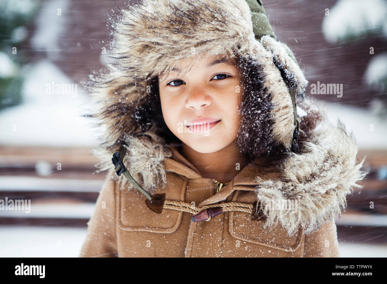 Portrait of confident girl wearing warm clothing during winter Stock ...