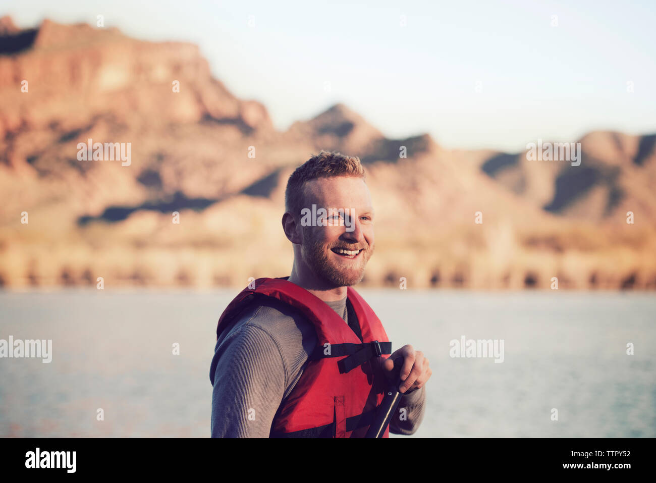 Man wearing life jacket hi-res stock photography and images - Alamy