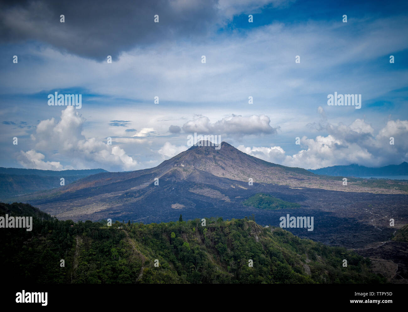 A peak on the horizon, Bali Stock Photo - Alamy