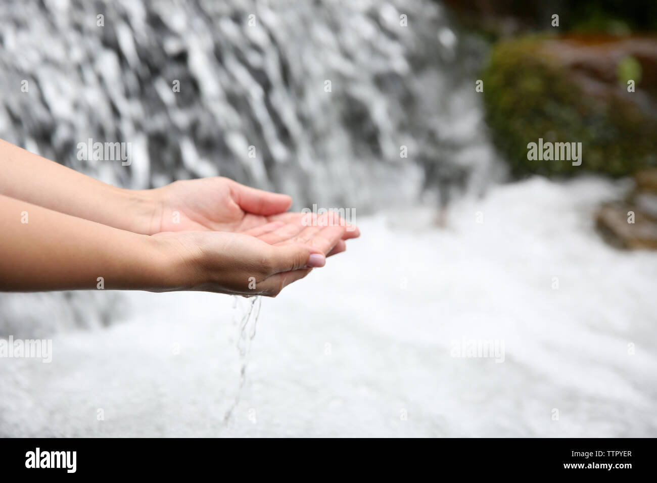 Female hands holding water waterfall hi-res stock photography and ...