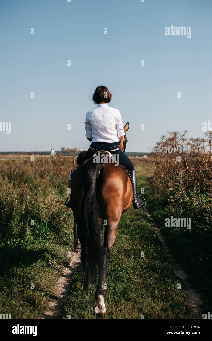 Rear View Horse Rider High Resolution Stock Photography and Images - Alamy