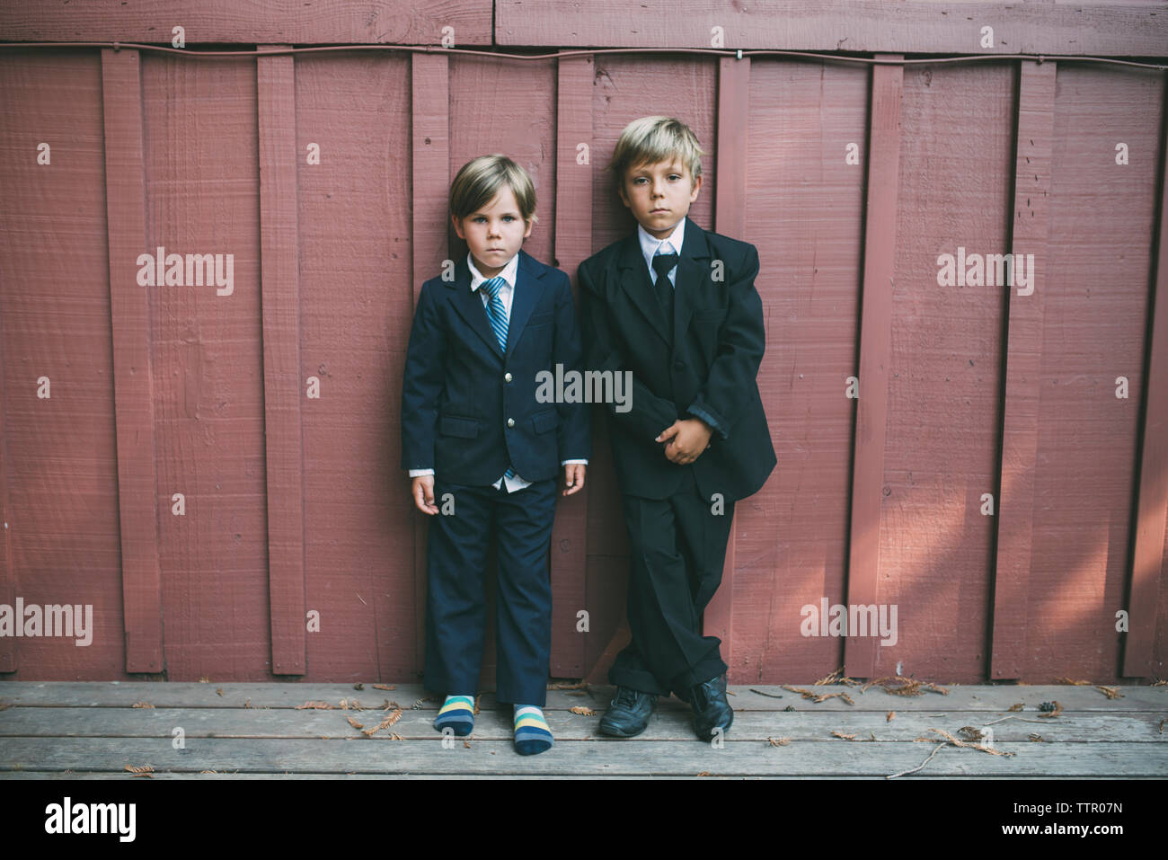 Wearing suits hi-res stock photography and images - Alamy