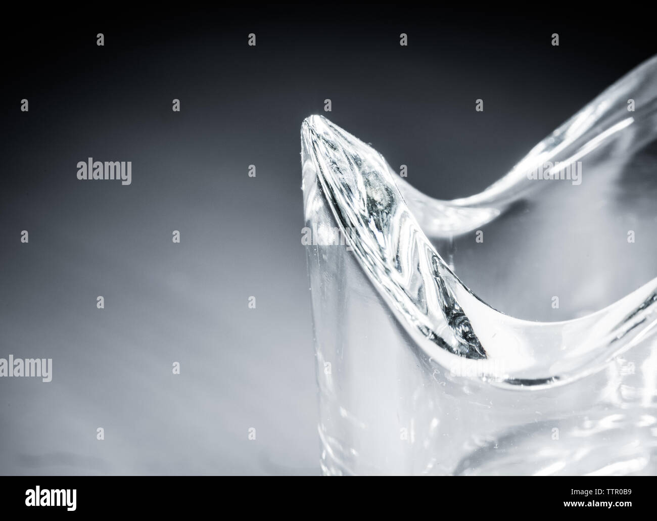 Fracture on a glass edge Stock Photo - Alamy