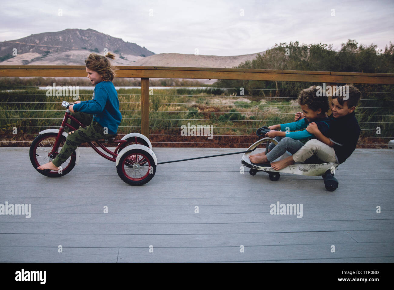 Boy pulling toy car hi-res stock photography and images - Alamy