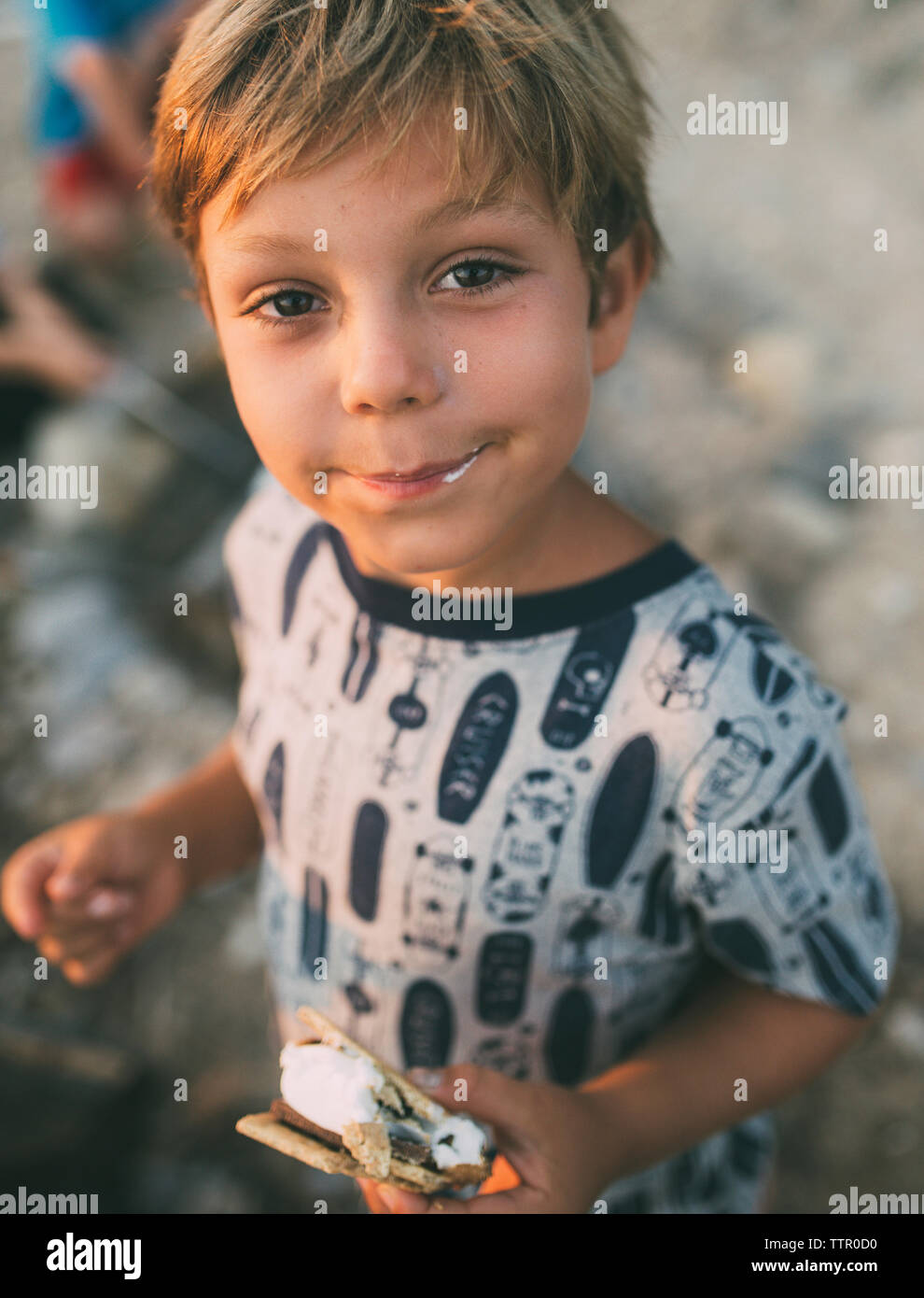 Boy eating sweet hi-res stock photography and images - Alamy