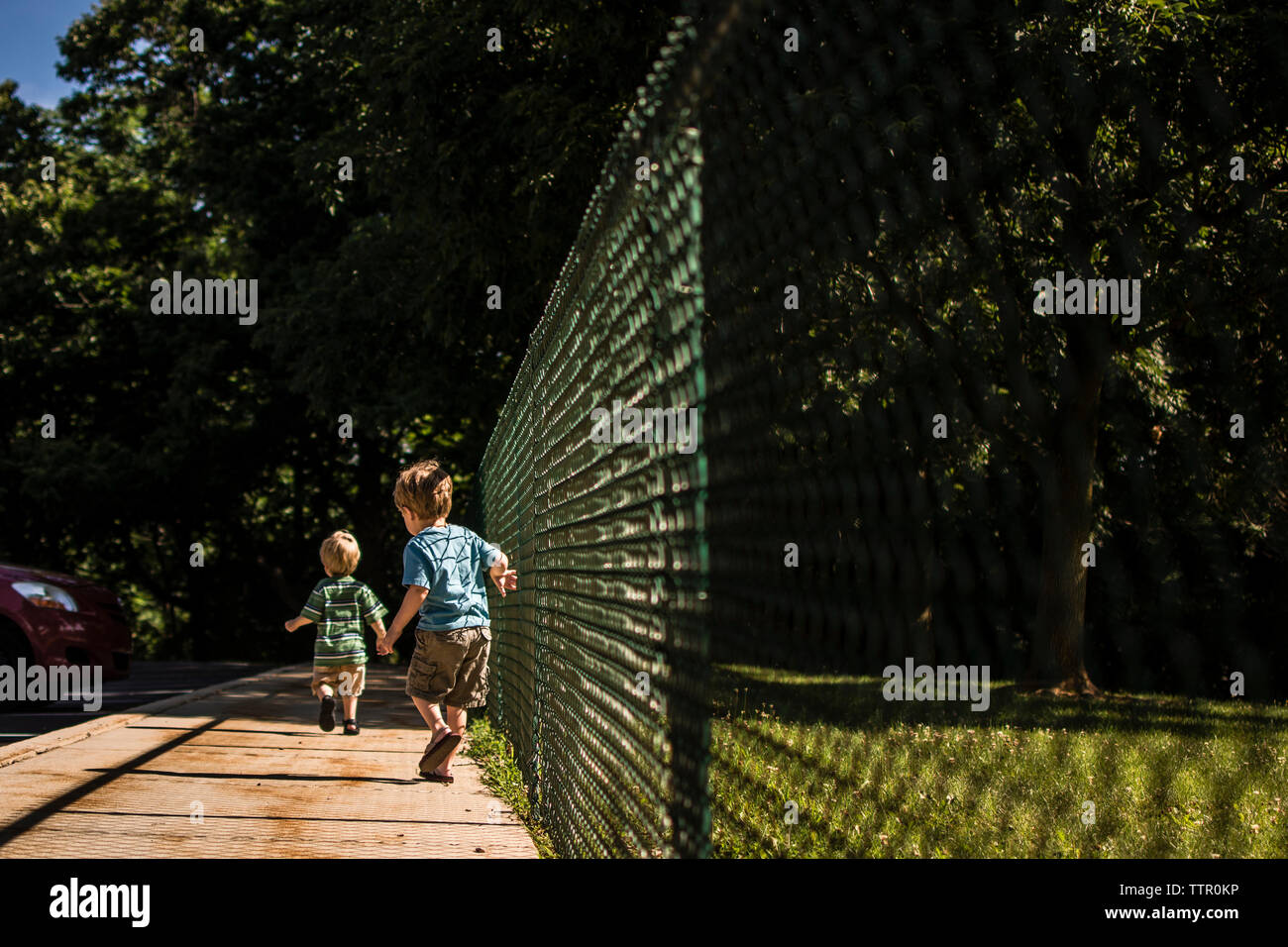 Brothers walking hi-res stock photography and images - Alamy