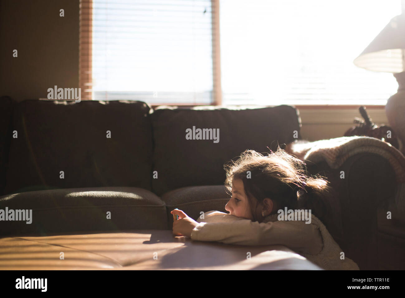 Sitting bored on floor hi-res stock photography and images - Alamy