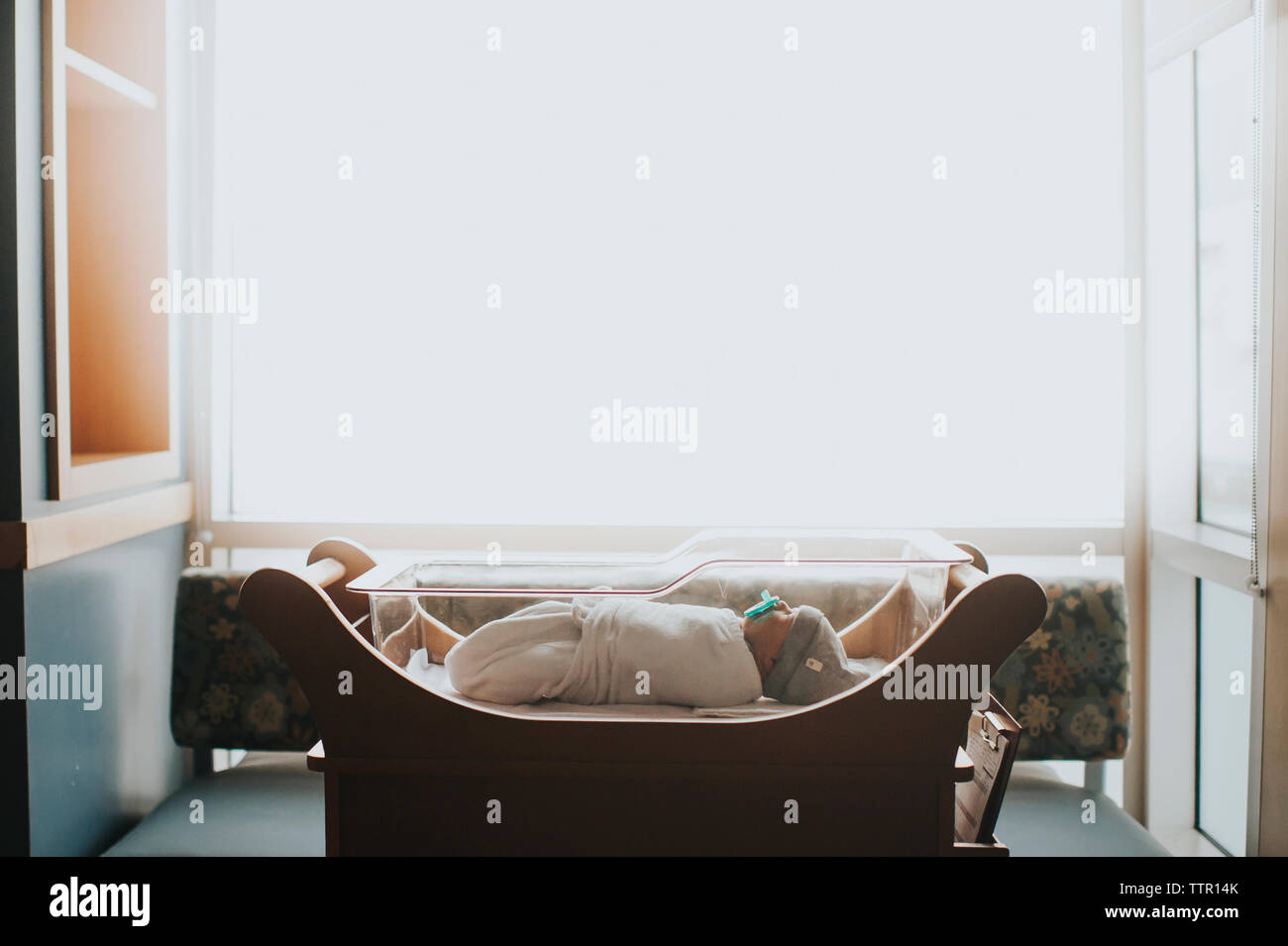 Baby sleeping in crib hi-res stock photography and images - Alamy