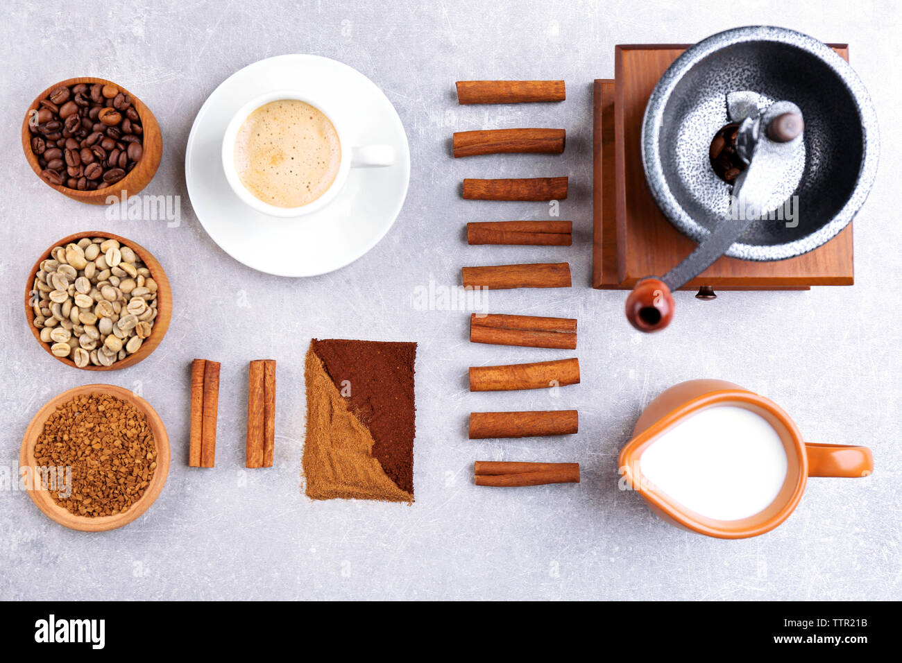 Fresh coffee with ingredients and accessories on grey background Stock ...