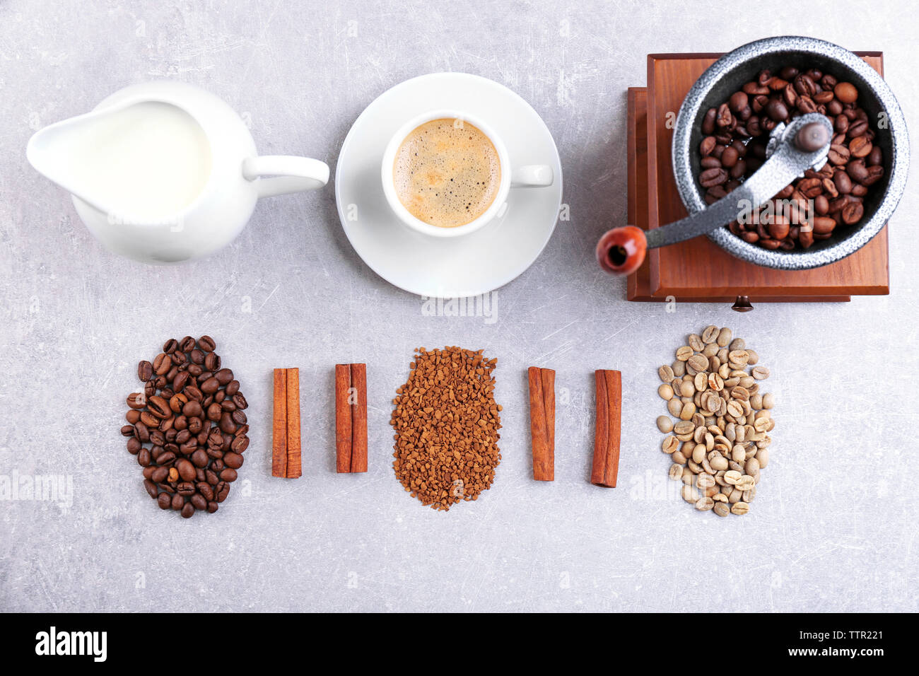 Fresh coffee with ingredients and accessories on grey background Stock ...
