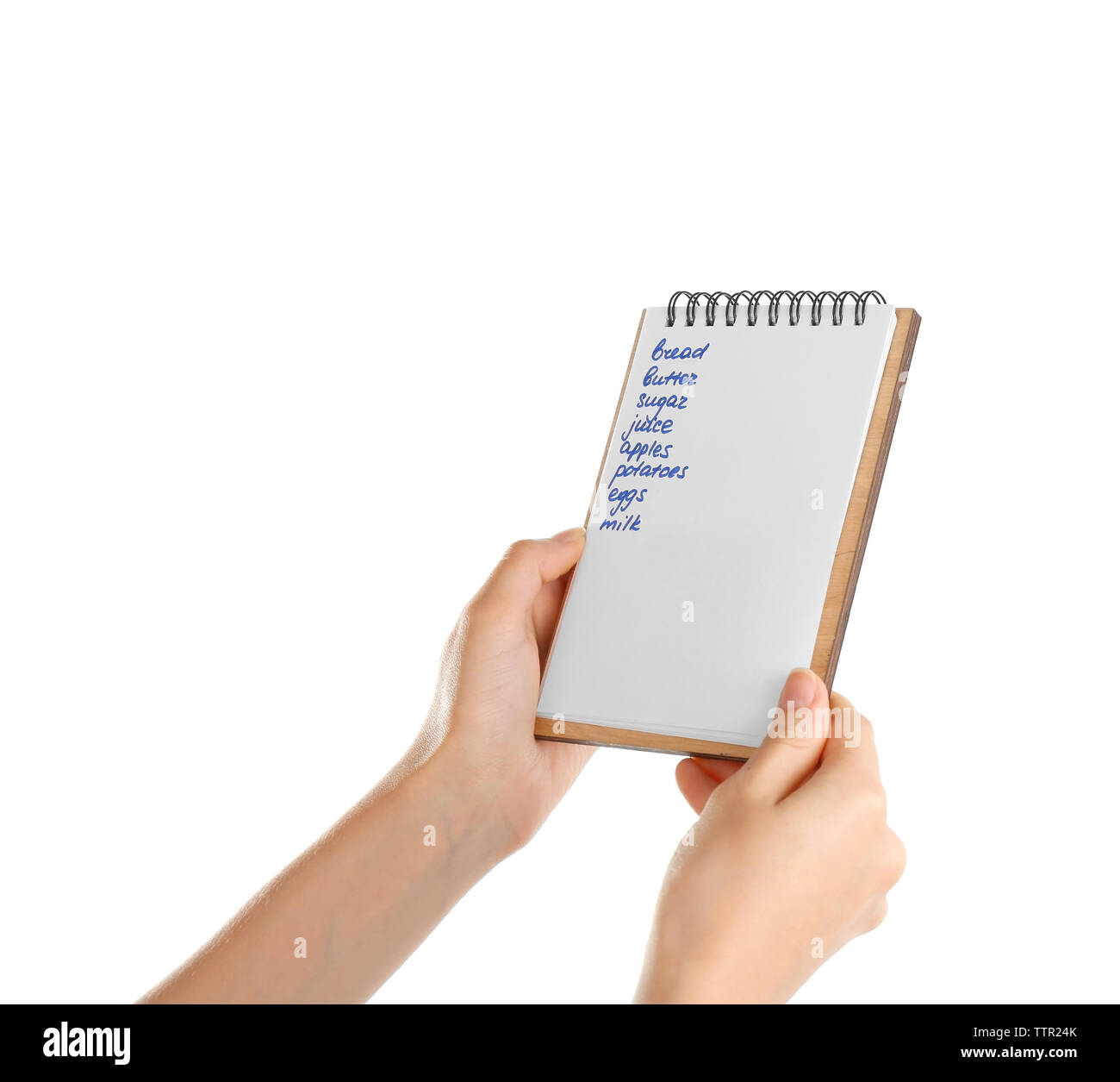 Hands holding notepad with shopping list on white background Stock ...