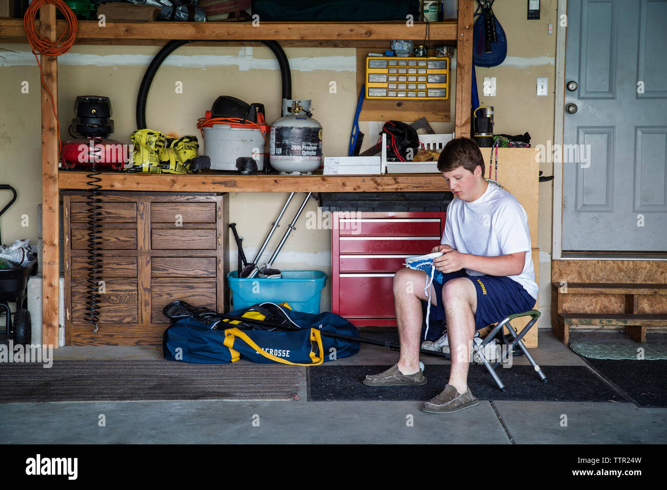 Holding stool hi-res stock photography and images - Alamy
