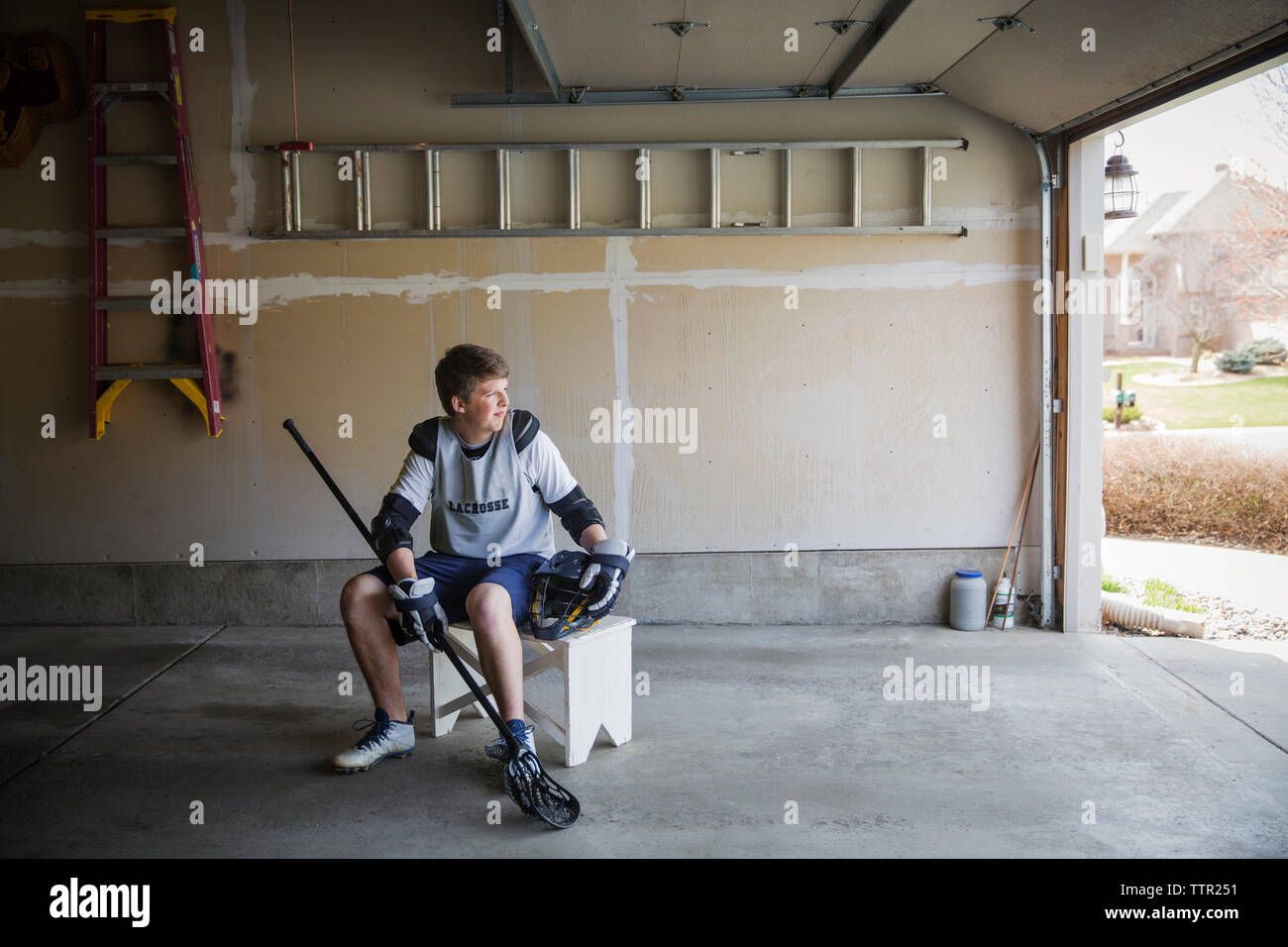 Man holding stick hi-res stock photography and images - Alamy