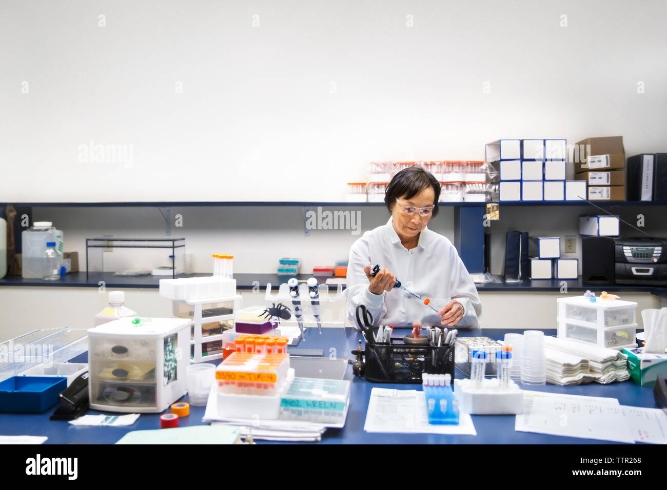 Scientist Using Pipette In Laboratory High Resolution Stock Photography ...