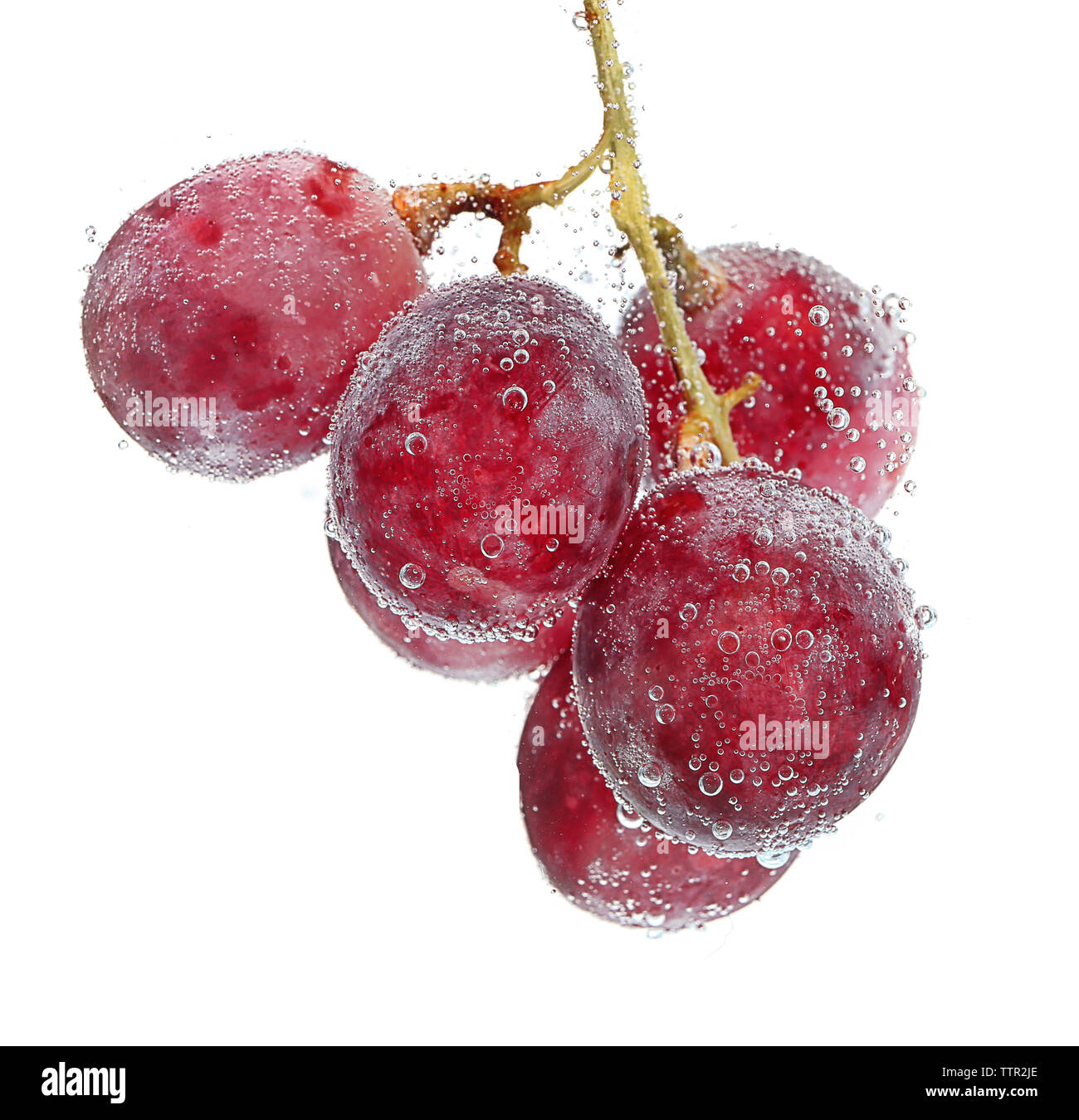 Grapes in a water on white background Stock Photo - Alamy