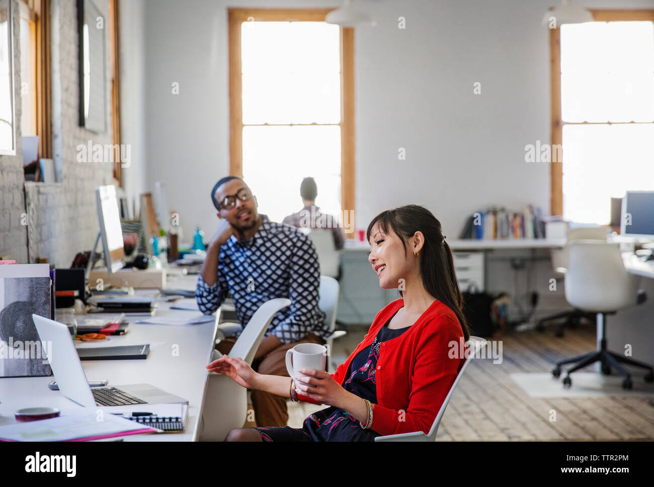 Old businessman talking colleague in hi-res stock photography and ...