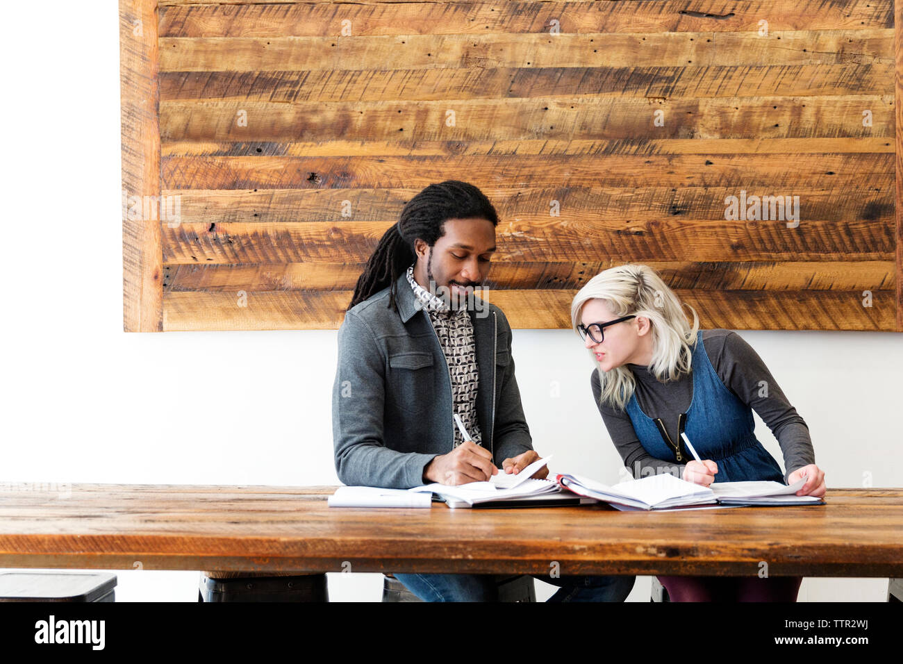 Group coworkers small conference table hi-res stock photography and ...