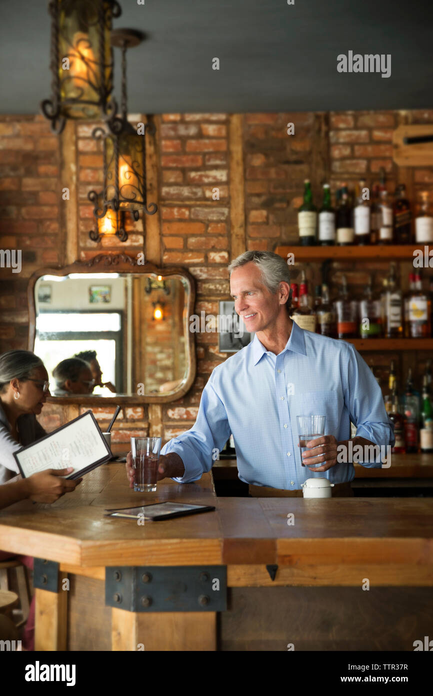 Customers at bar counter hi-res stock photography and images - Alamy