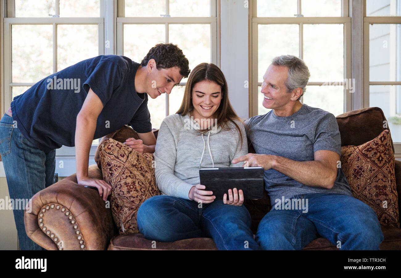 Family tablet home hi-res stock photography and images - Alamy