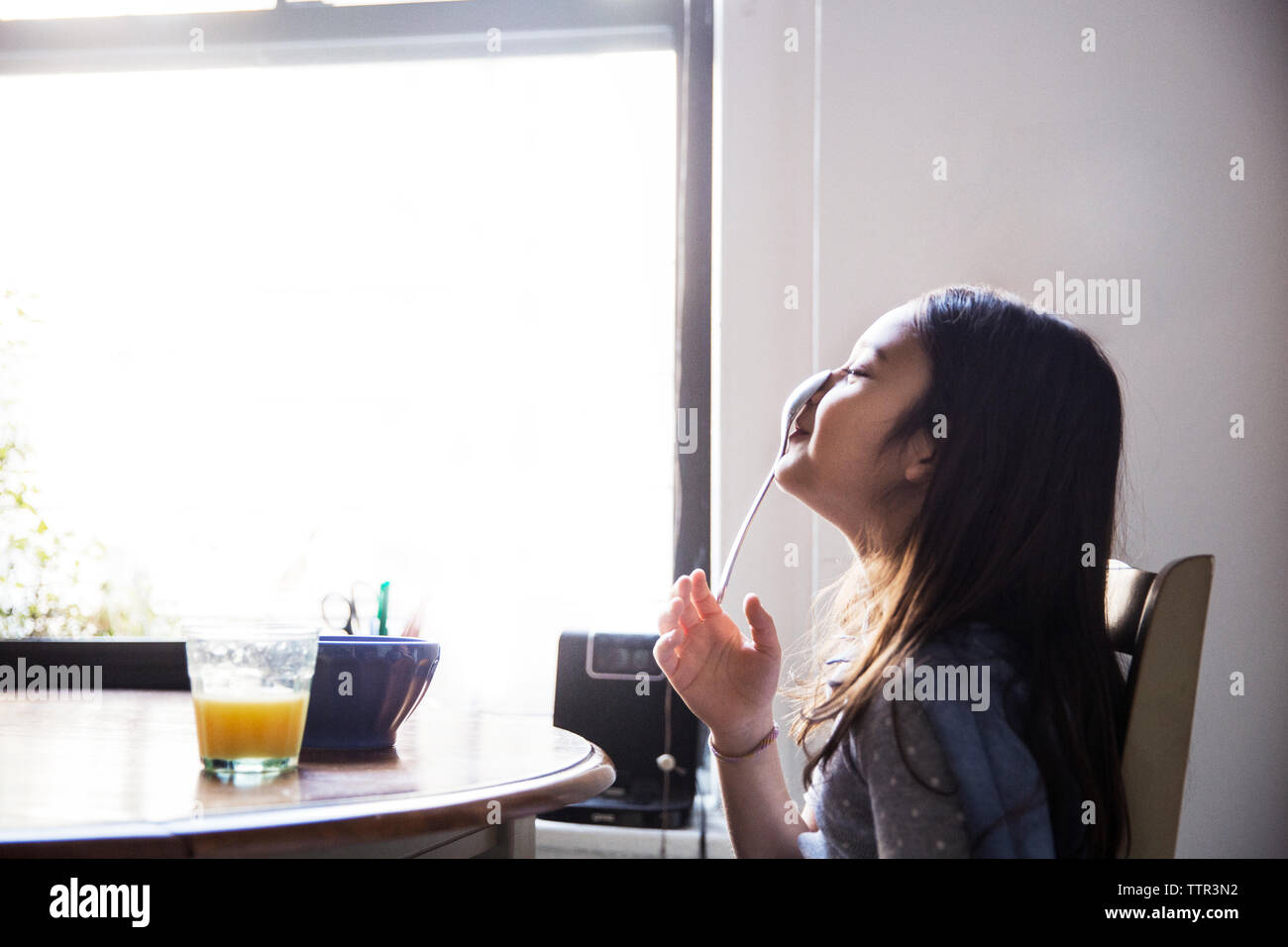 Spoon balance nose hi-res stock photography and images - Alamy