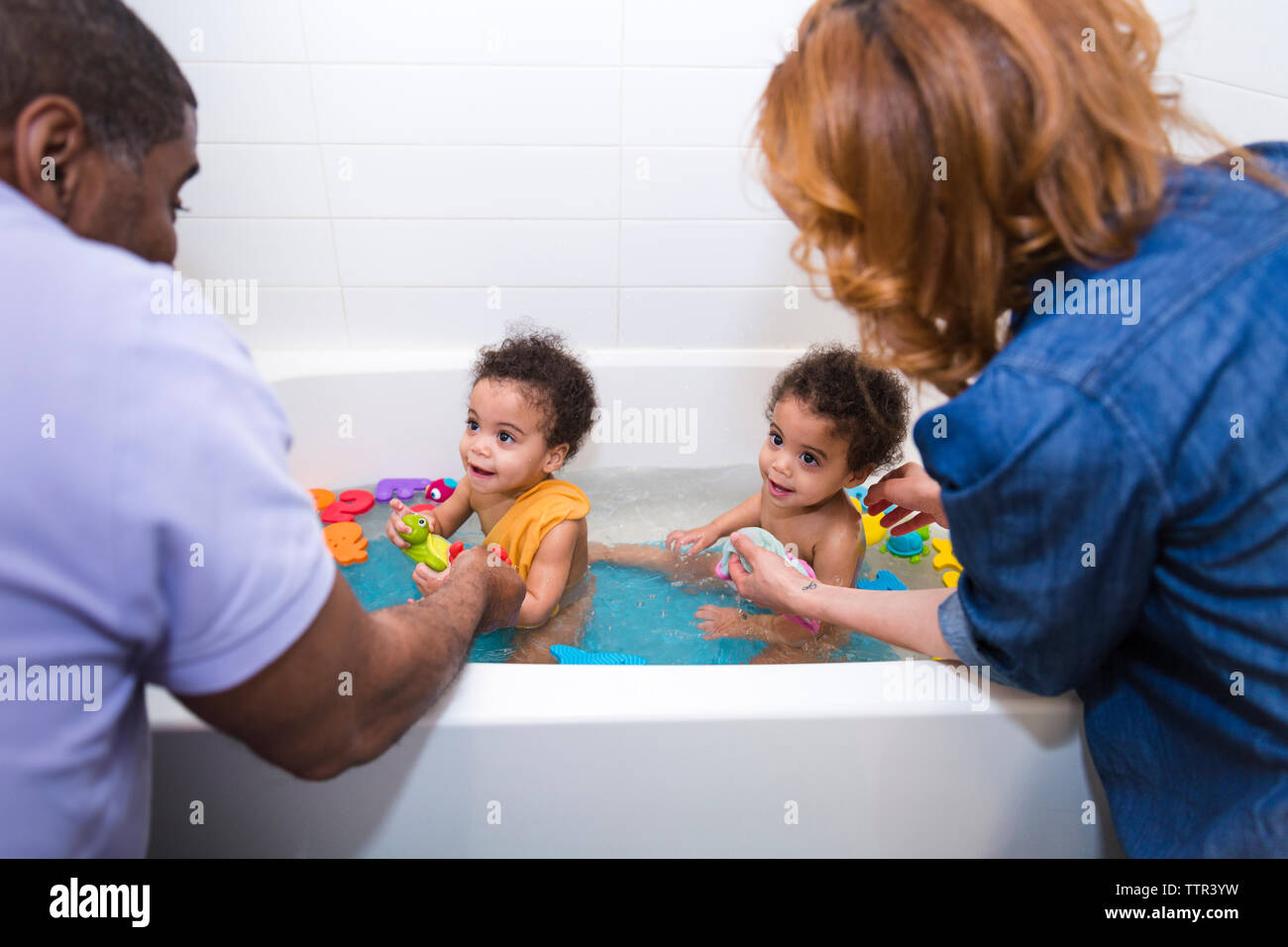 Siblings bathing together hi-res stock photography and images - Alamy