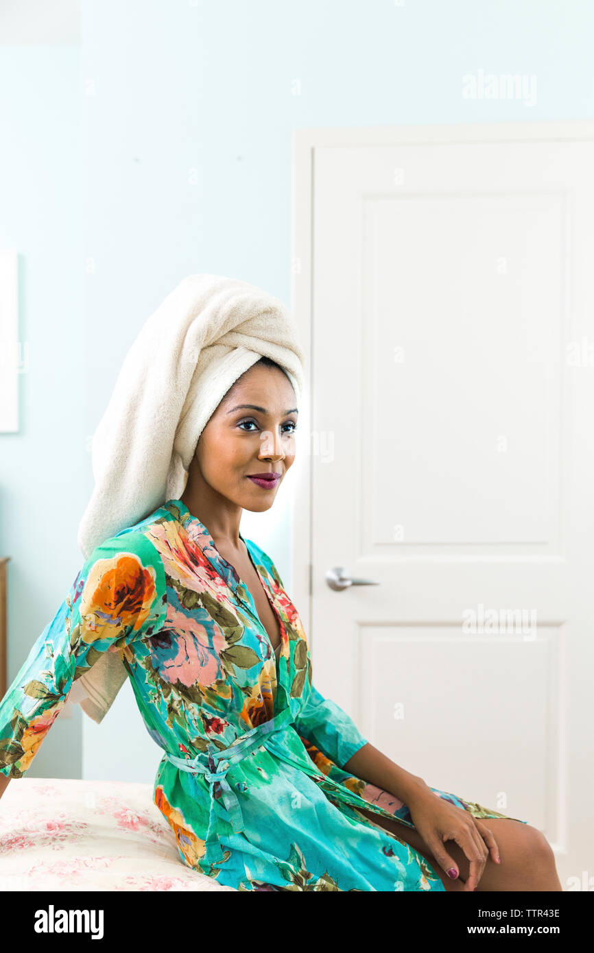Woman wearing bathrobe towel hi-res stock photography and images - Alamy