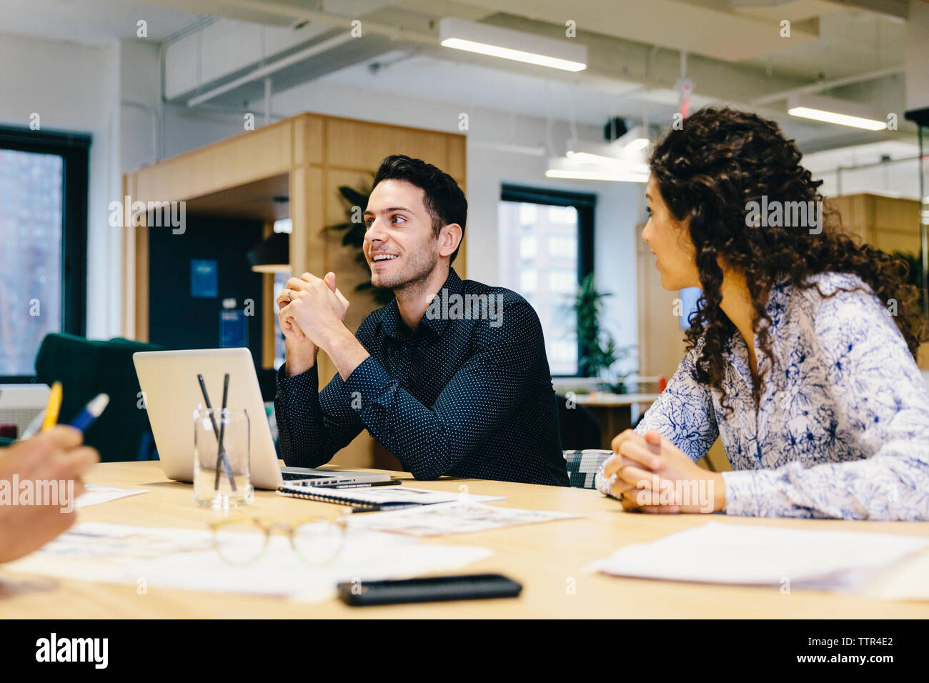 business people with laptop computer on desk planning while sitting in ...