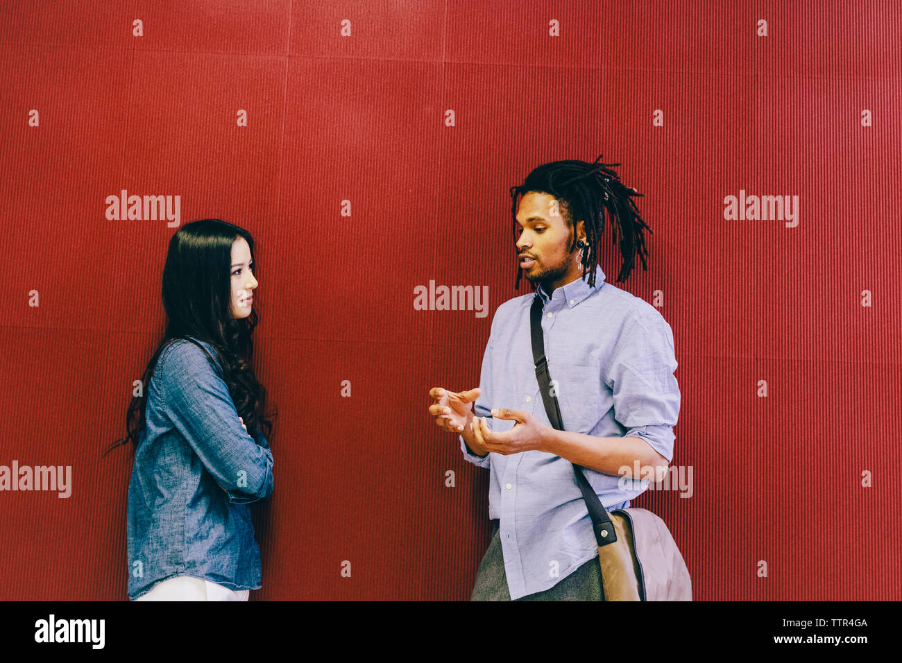 Group indian people standing talking hi-res stock photography and ...