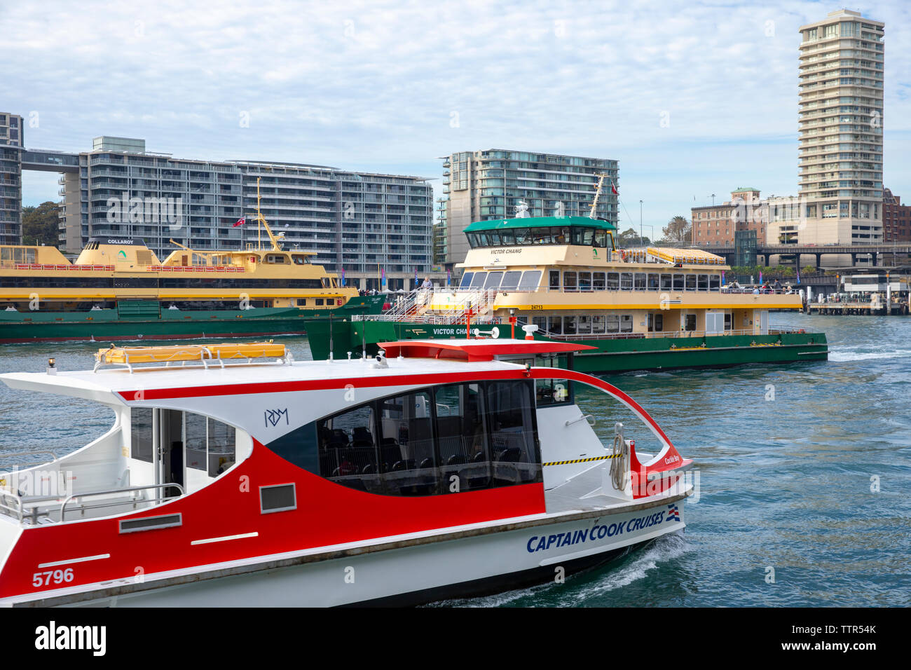 Captain Cook cruises boat and Sydney ferries on Sydney harbour at ...