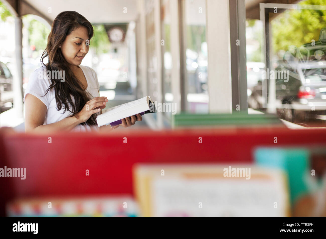 Old bookstore woman hi-res stock photography and images - Alamy
