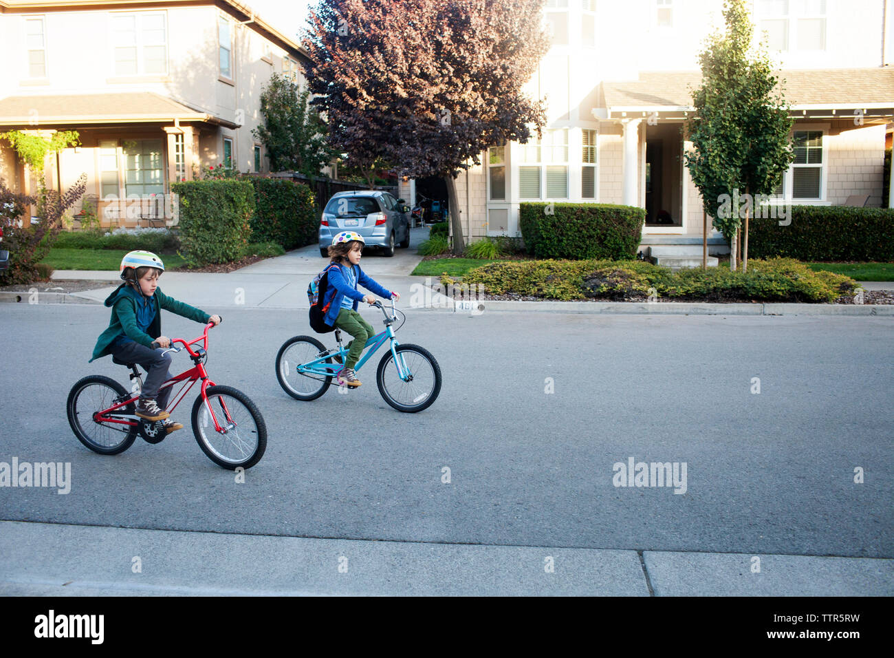 Two boys on bicycles hi-res stock photography and images - Alamy