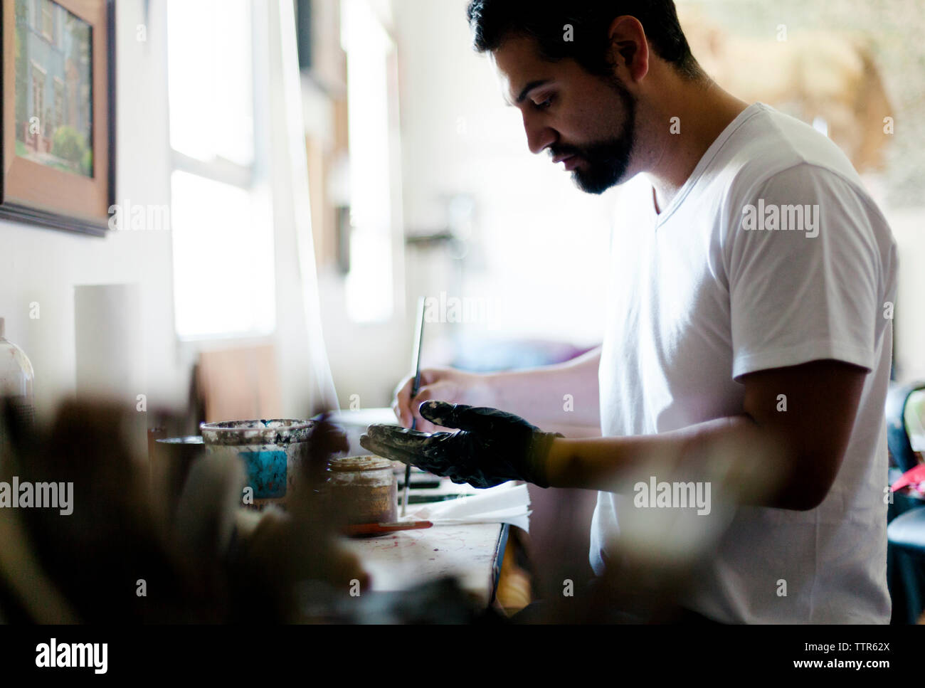 Painter painting in his studio hi-res stock photography and images - Alamy